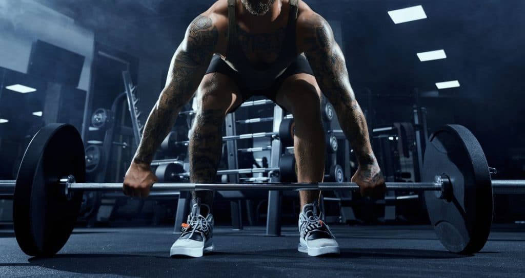 B-Stance RDL Exercise Guide: How to, Benefits, & More - Generation Iron ...